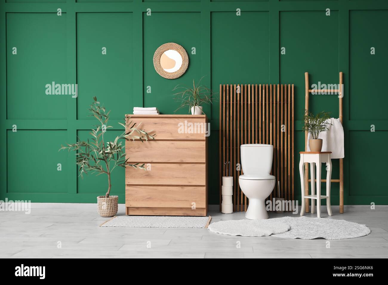 Interior of restroom with toilet bowl, commode and table Stock Photo ...