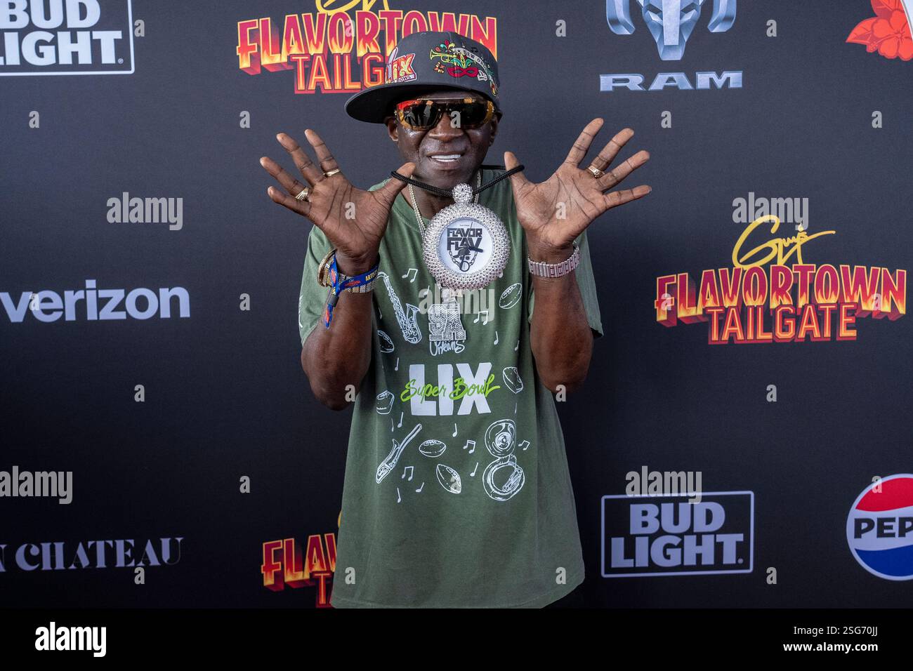 Flavor Flav attends Guy Fieri's Flavortown Tailgate on Sunday, Feb. 9 ...