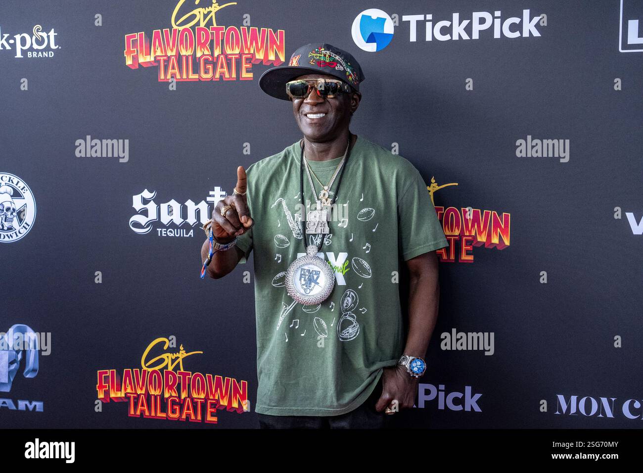 Flavor Flav attends Guy Fieri's Flavortown Tailgate on Sunday, Feb. 9 ...