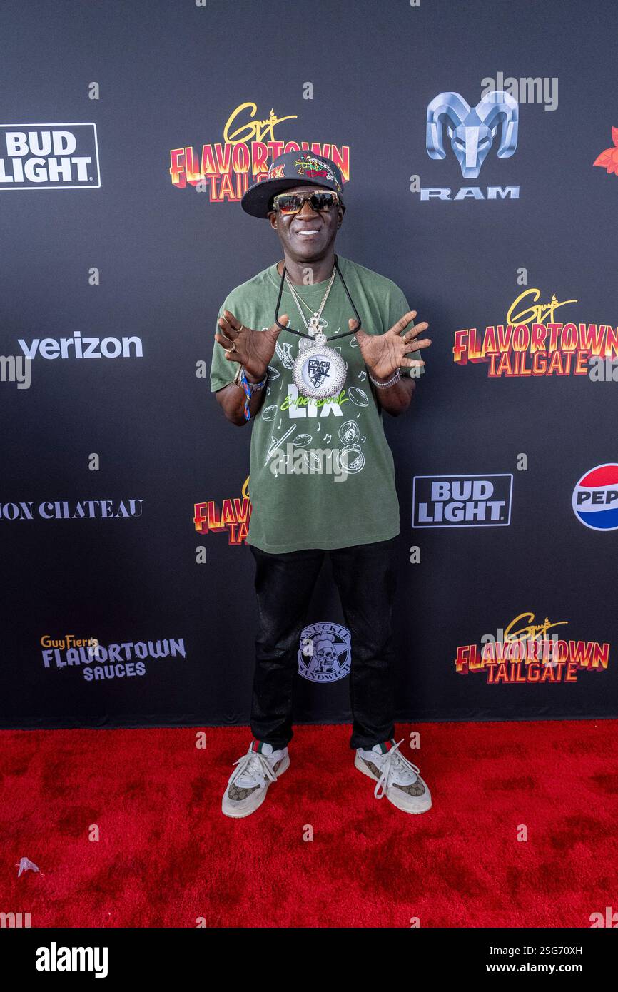 Flavor Flav attends Guy Fieri's Flavortown Tailgate on Sunday, Feb. 9 ...