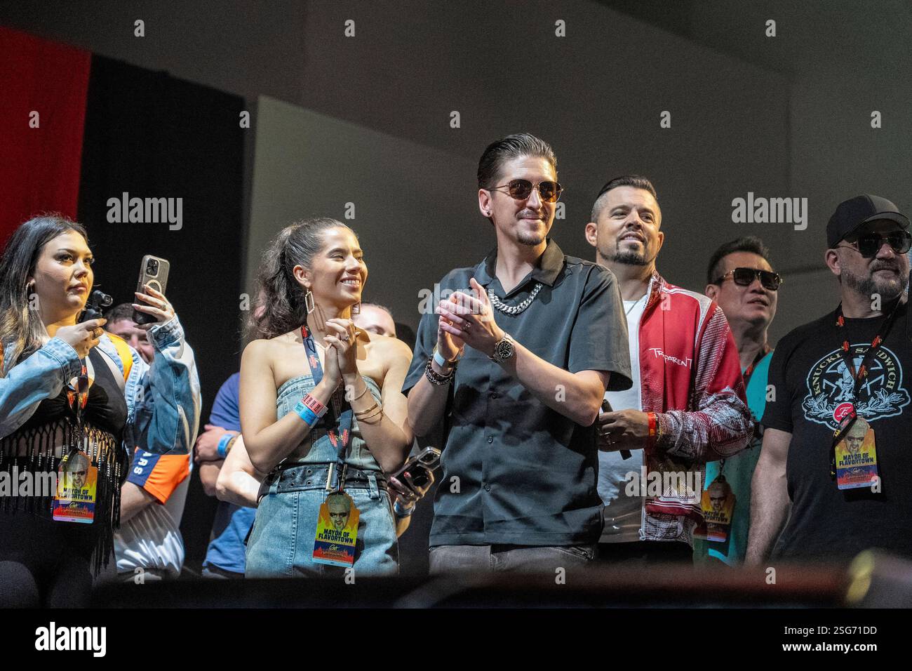 Tara Bernstein, left, and Hunter Fieri on stage during the Guy Fieri's ...