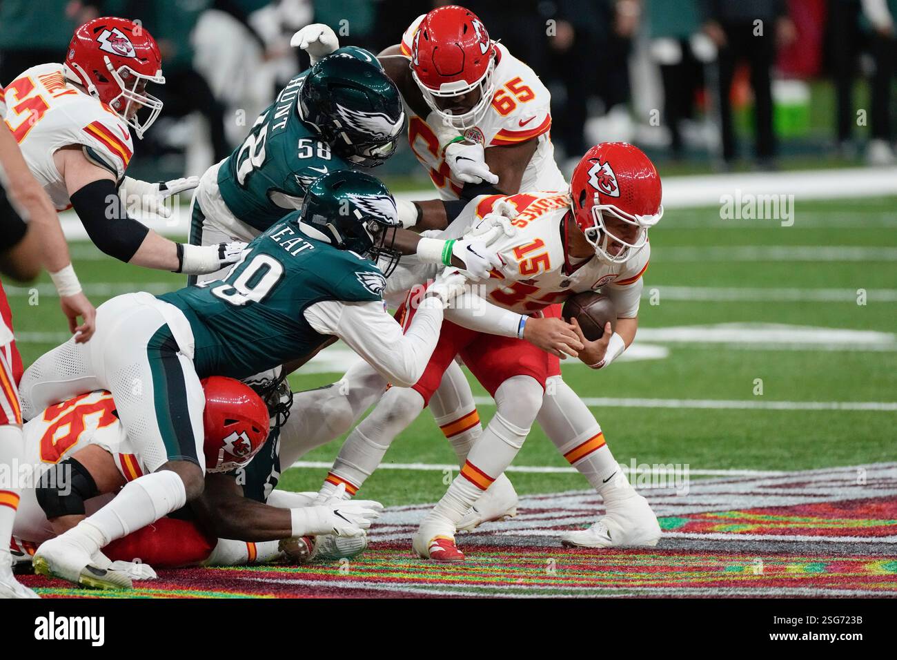 Kansas City Chiefs quarterback Patrick Mahomes (15) is sacked by ...