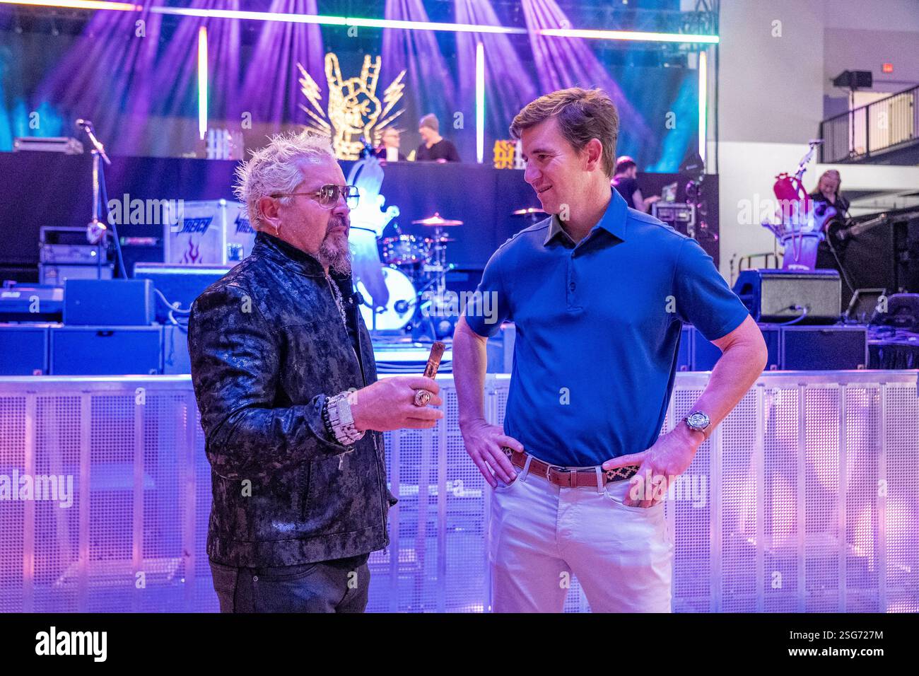 Guy Fieri, left, and Eli Manning attend Guy Fieri's Flavortown Tailgate ...