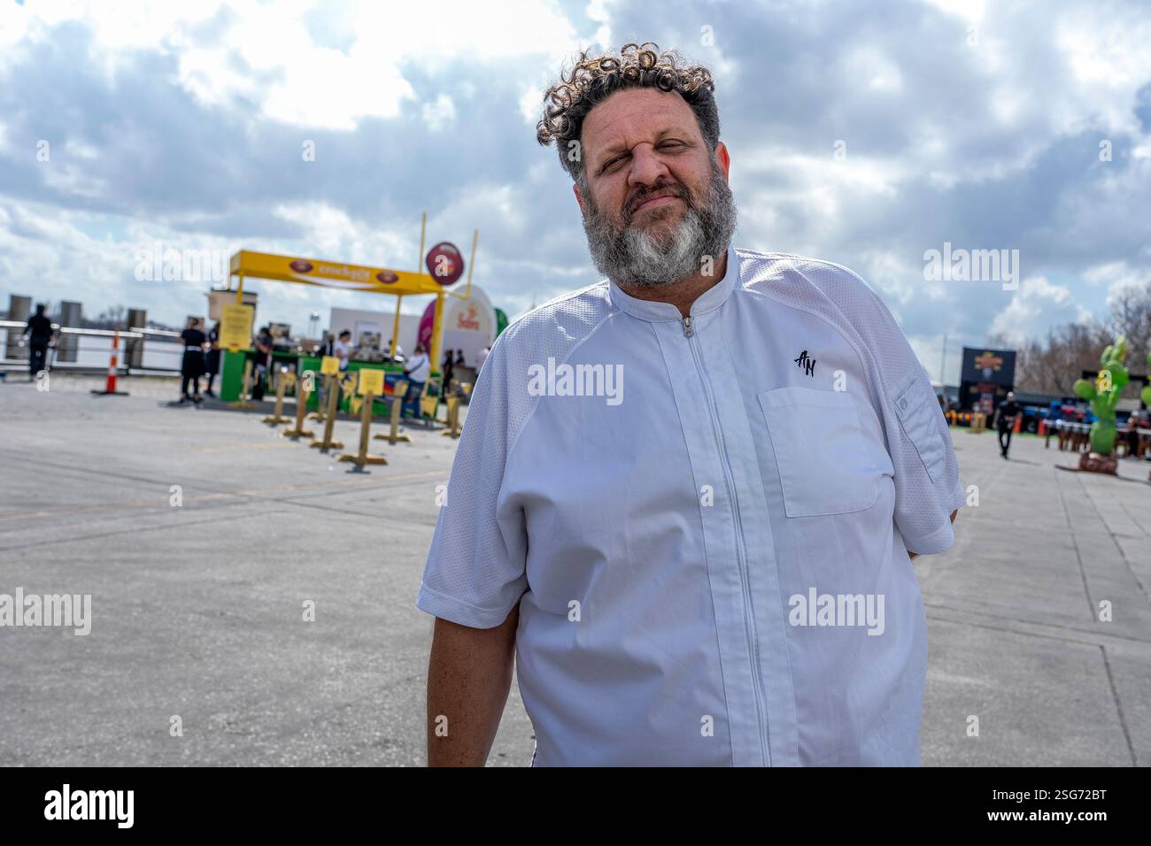 Chef Aaron May attends Guy Fieri's Flavortown Tailgate on Sunday, Feb ...