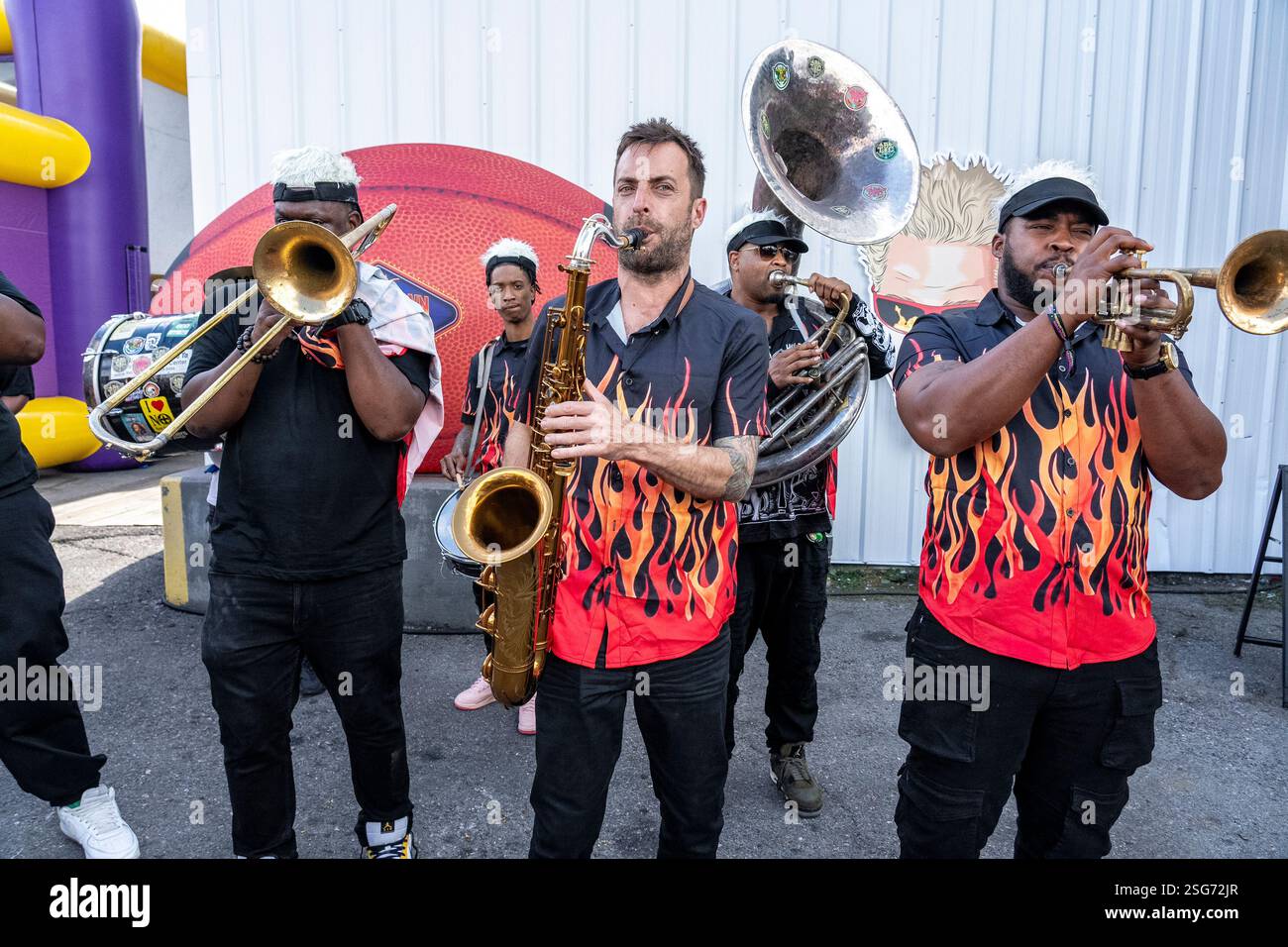 Fans attend Guy Fieri's Flavortown Tailgate on Sunday, Feb. 9, 2025, in ...