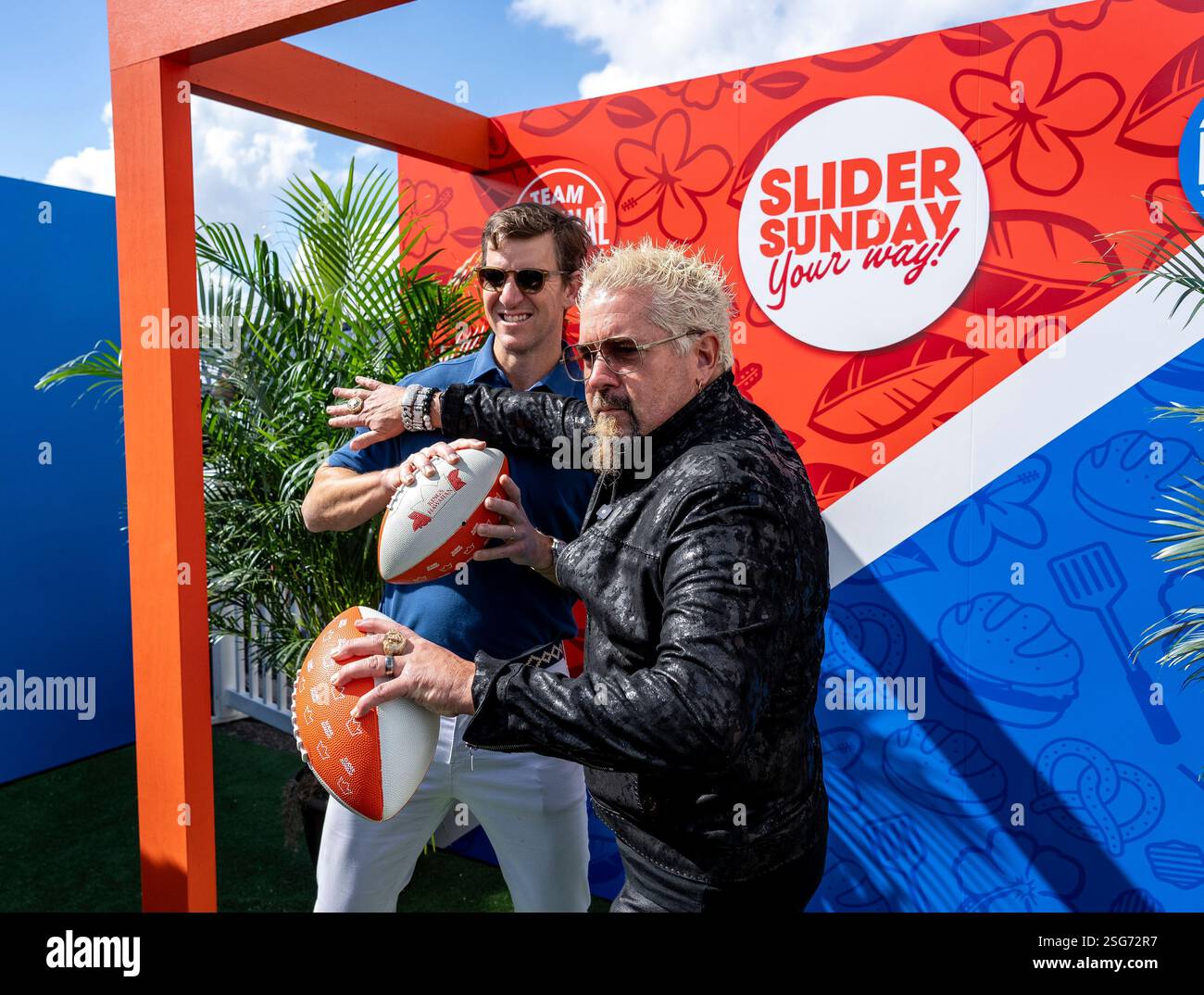 Eli Manning, left, and Guy Fieri attend Guy Fieri's Flavortown Tailgate ...