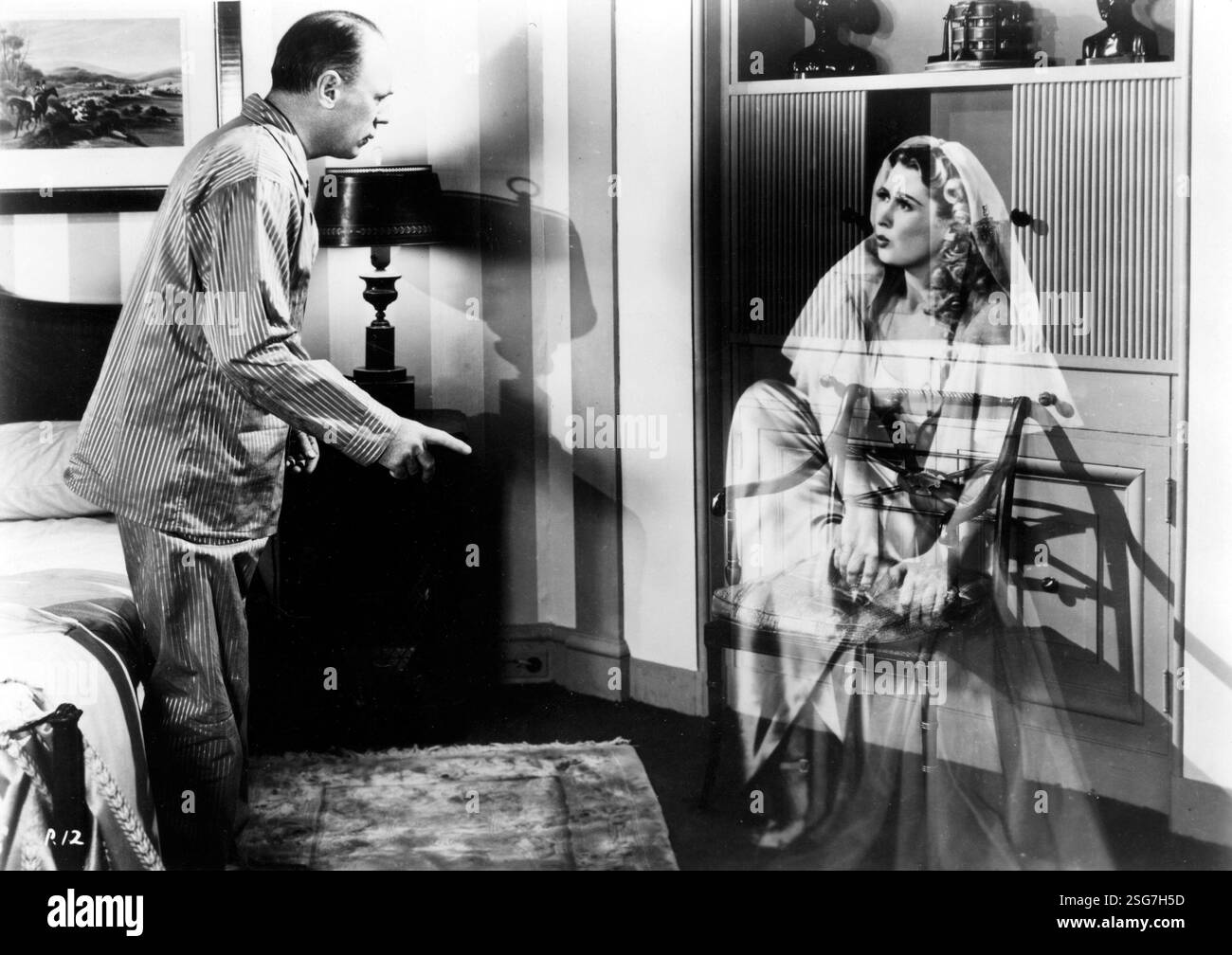 TOPPER RETURNS ROLAND YOUNG, JOAN BLONDELL Date: 1941 Stock Photo - Alamy