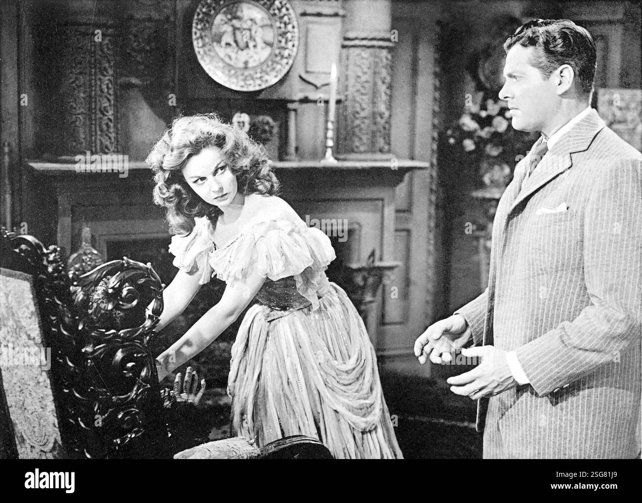 THE LOST MOMENT SUSAN HAYWARD, ROBERT CUMMINGS Date: 1947 Stock Photo ...