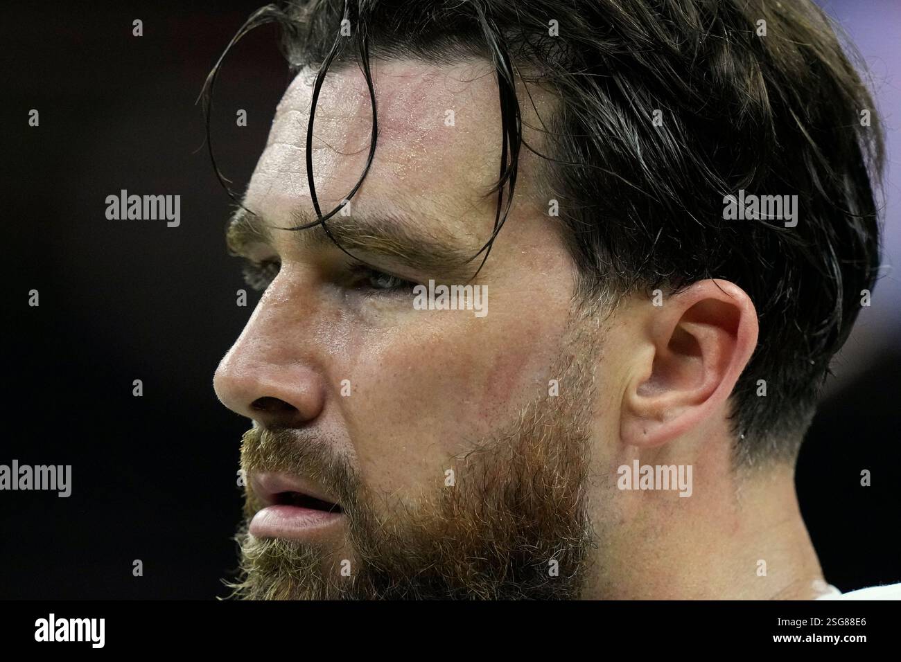 Kansas City Chiefs tight end Travis Kelce watches from the sidelines ...