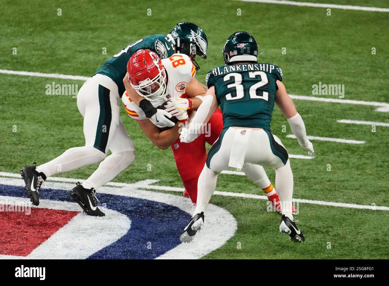 Kansas City Chiefs tight end Travis Kelce (87) is hit by Philadelphia ...