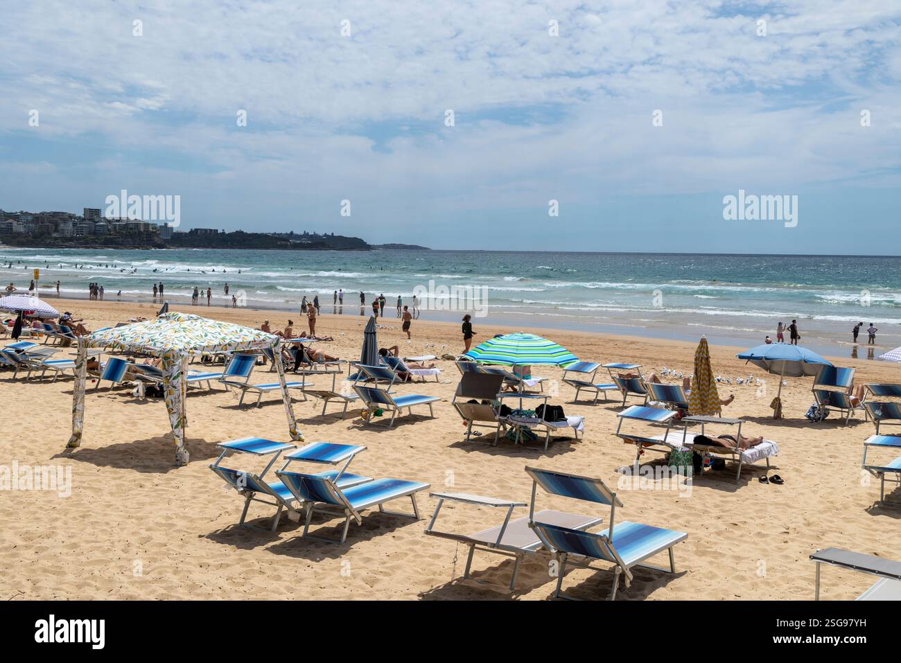 Manly Beach, Sydney, Australia, people relax on sunloungers on a ...