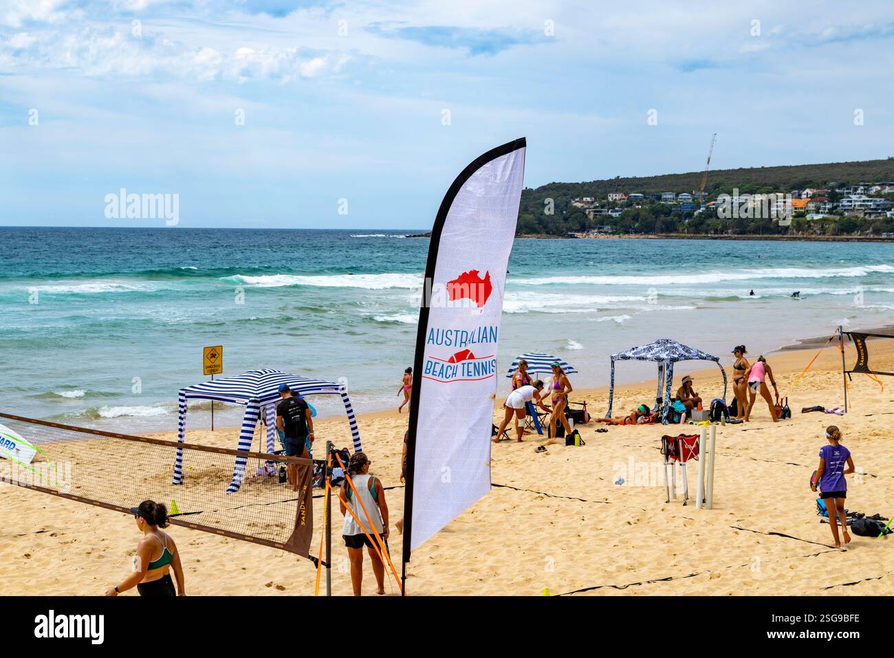 People playing beach tennis on Manly Beach in Sydney, summer sport ...