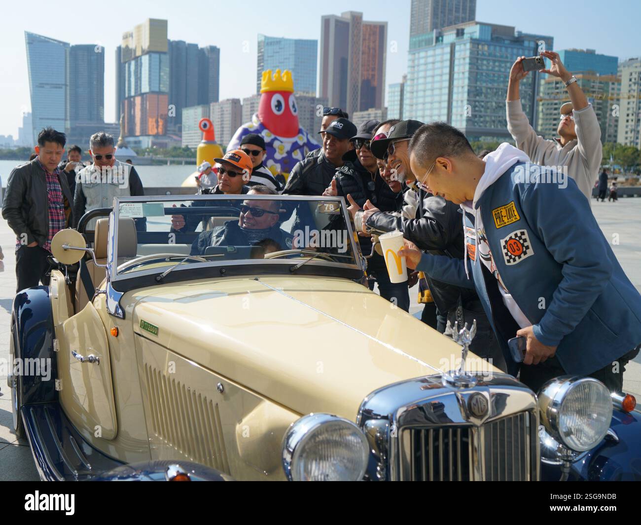 Macao,China.9th February 2025. A classic car is parked on the square in ...