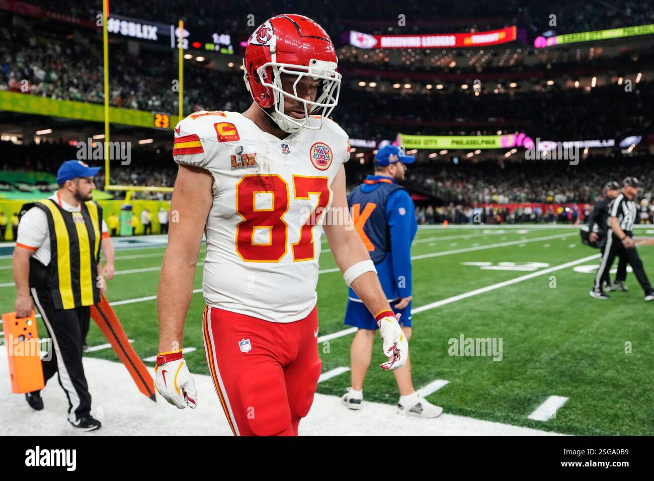 Kansas City Chiefs tight end Travis Kelce (87) walks to the bench ...