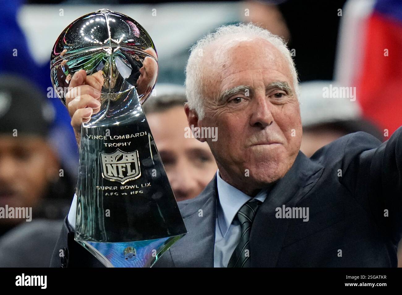 Philadelphia Eagles owner Jeffrey Lurie holds the Vince Lombardi Trophy ...