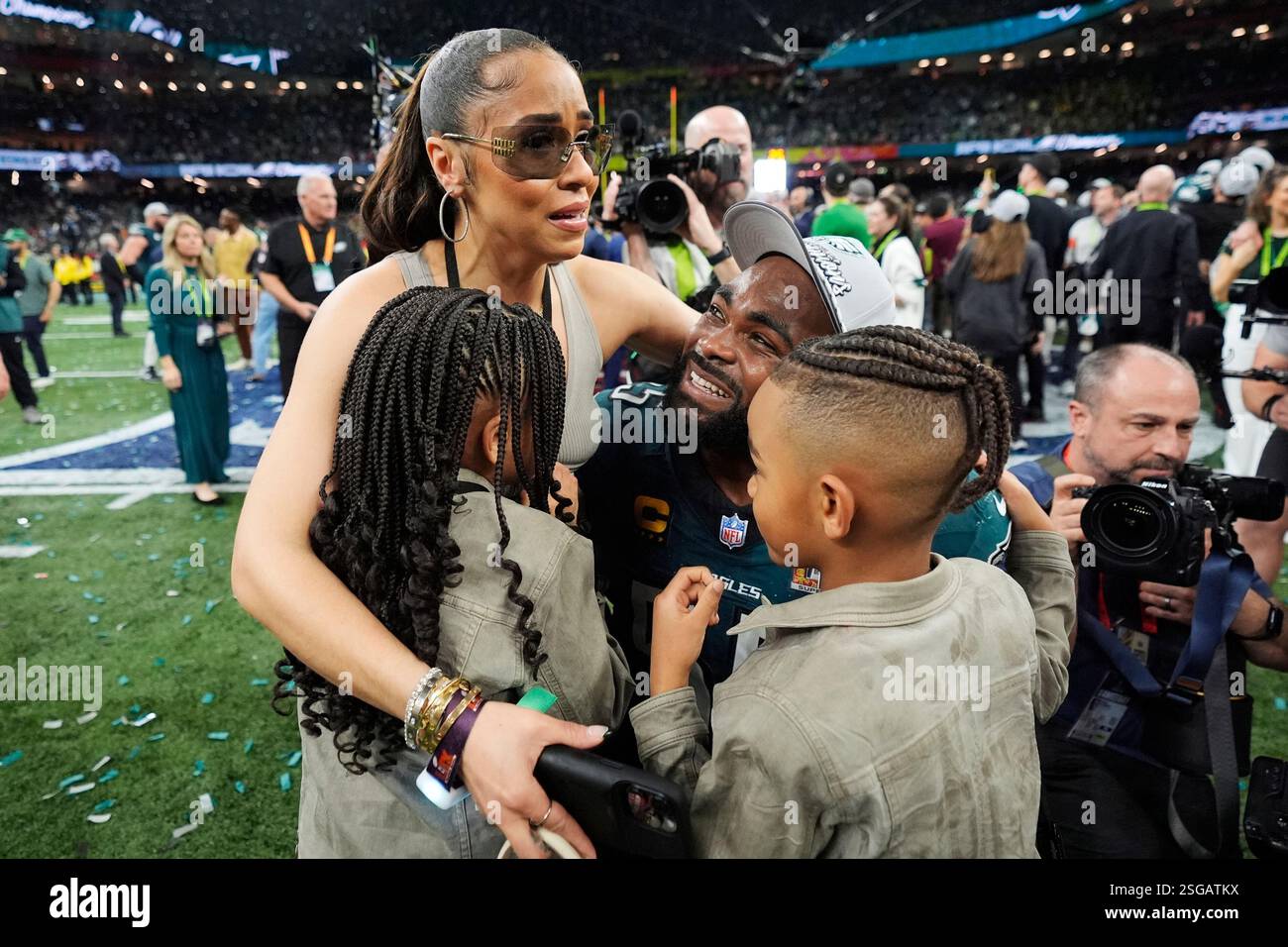 Philadelphia Eagles defensive end Brandon Graham hugs his wife Carlyne ...