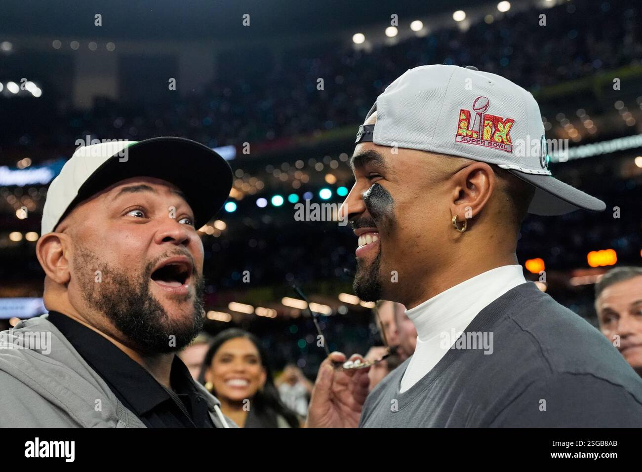 Philadelphia Eagles quarterback Jalen Hurts celebrates with his father ...