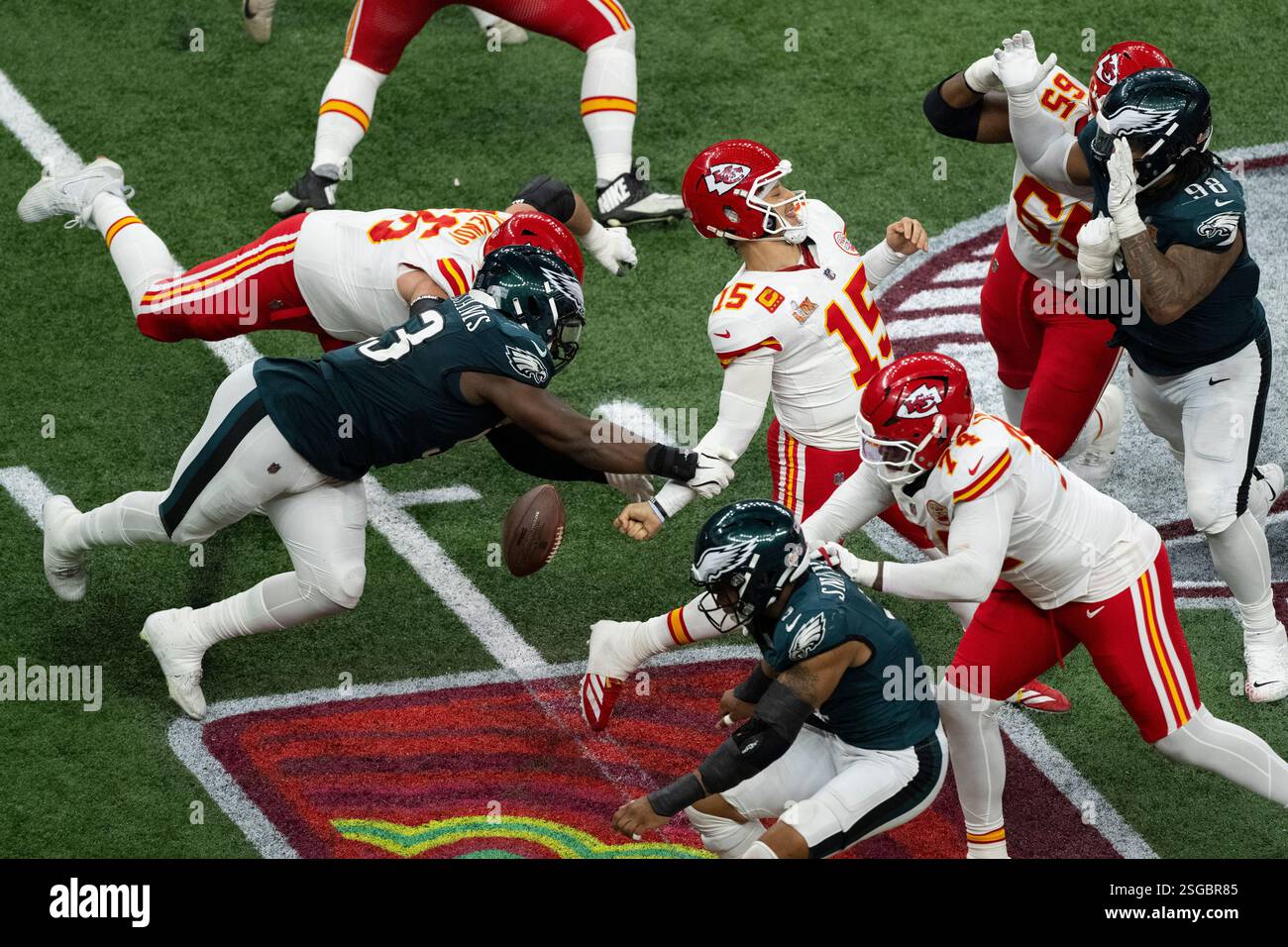 Philadelphia Eagles defensive tackle Milton Williams, left, stops a ...