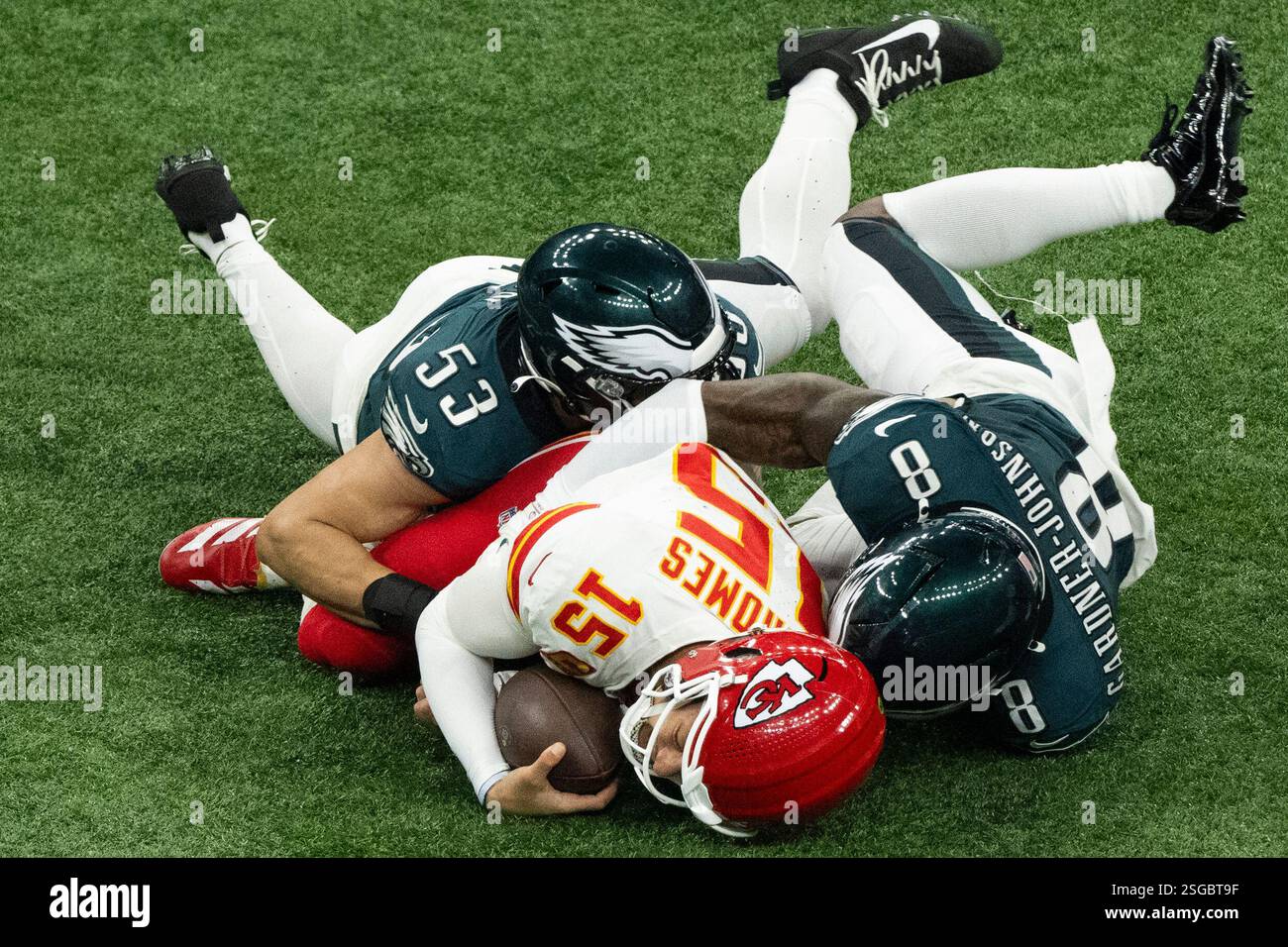 Kansas City Chiefs quarterback Patrick Mahomes (15) is tackled by ...