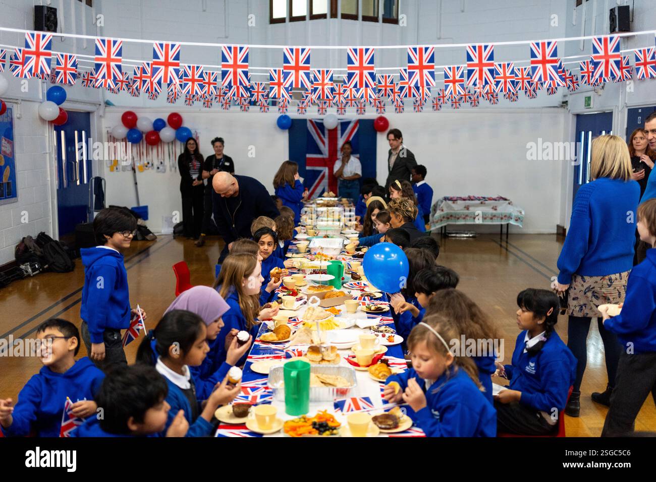 Primary School Children At A Buffet Brunch To Launch VE Day 80 At primary-school-children-at-a-buffet-brunch-to-launch-ve-day-80-at