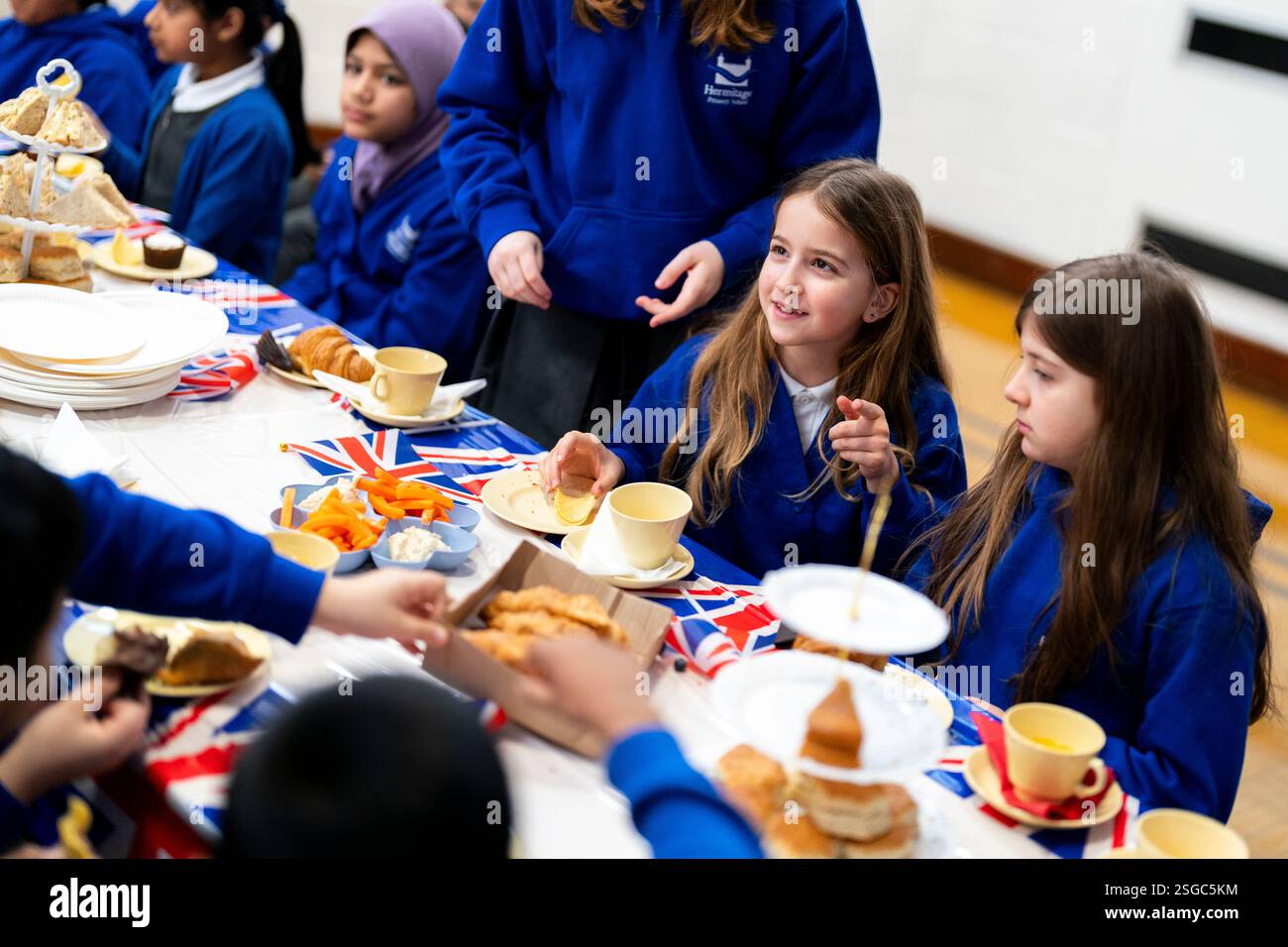 Primary school children at a buffet brunch to launch VE Day 80 at ...