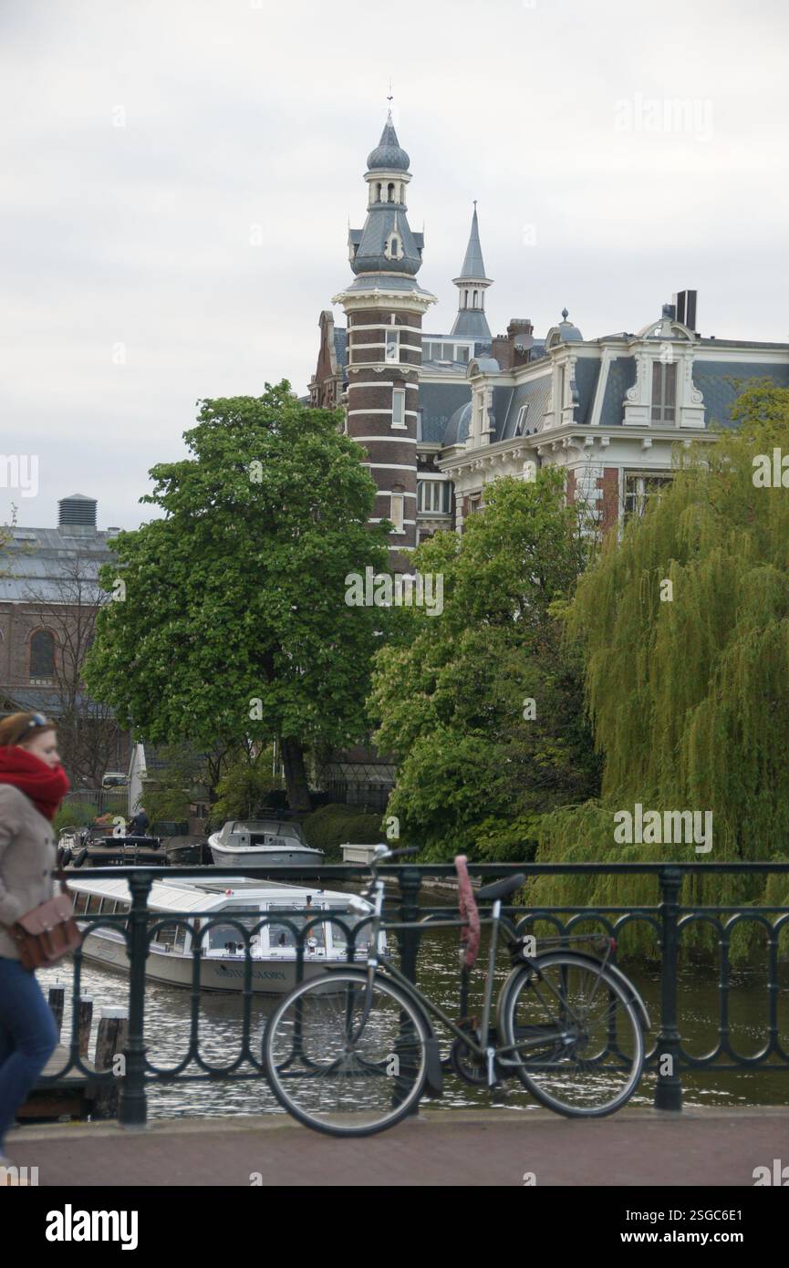Amsterdam's historic canal lined with grand architecture is a peaceful ...