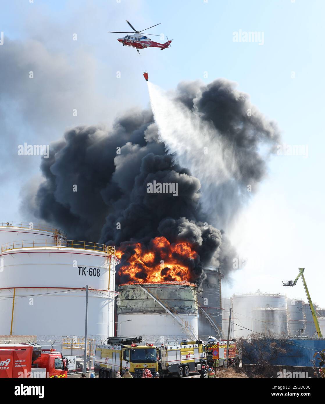 10th Feb, 2025. Explosion at oil storage tank A Fire Service helicopter ...