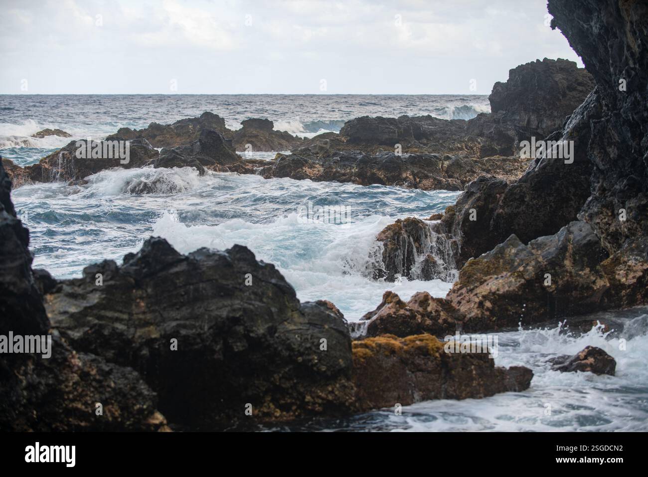 Rocky sea coast. Beautiful turquoise waters of the Sea. Ocean waves ...