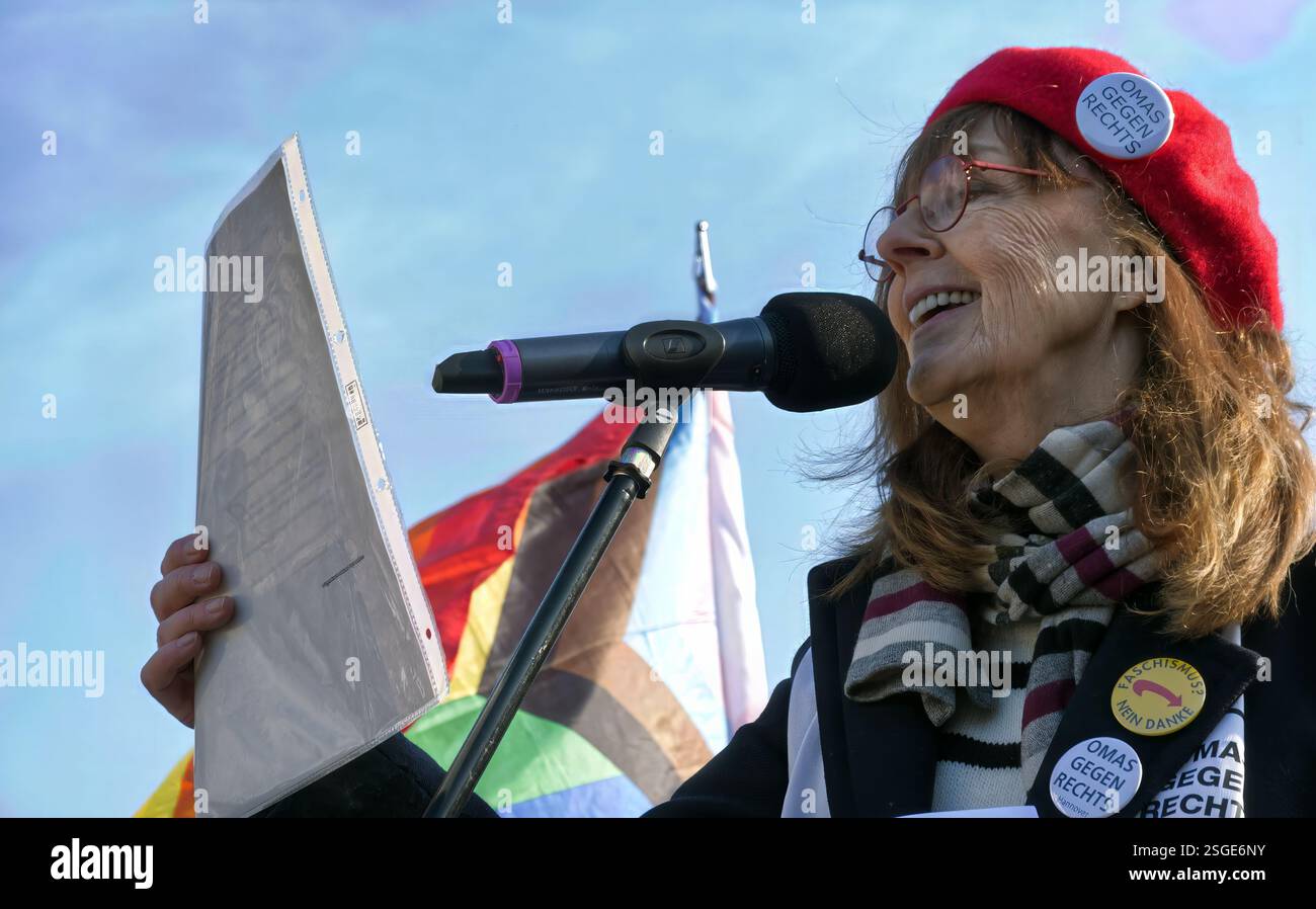 Hanover, Germany, February 8, 2025: Senior activist wearing a red beret ...