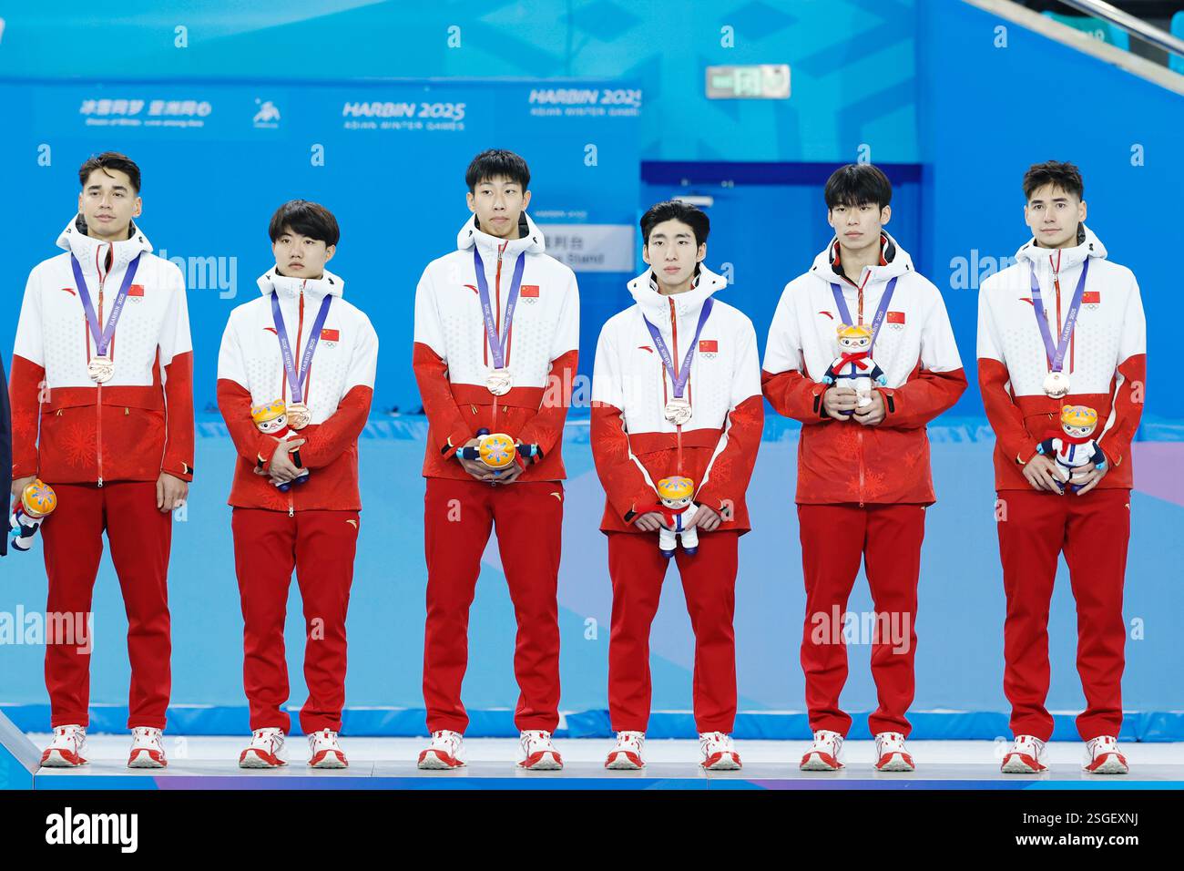 Harbin,China.9th February 2025. Bronze medalist Team China pose during ...