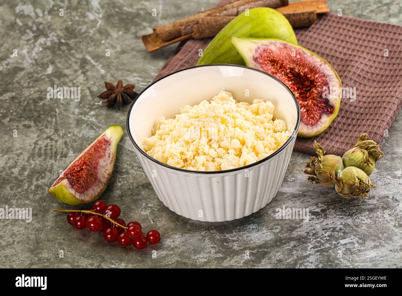 Delicous sheep cottage cheese curd served fig Stock Photo - Alamy