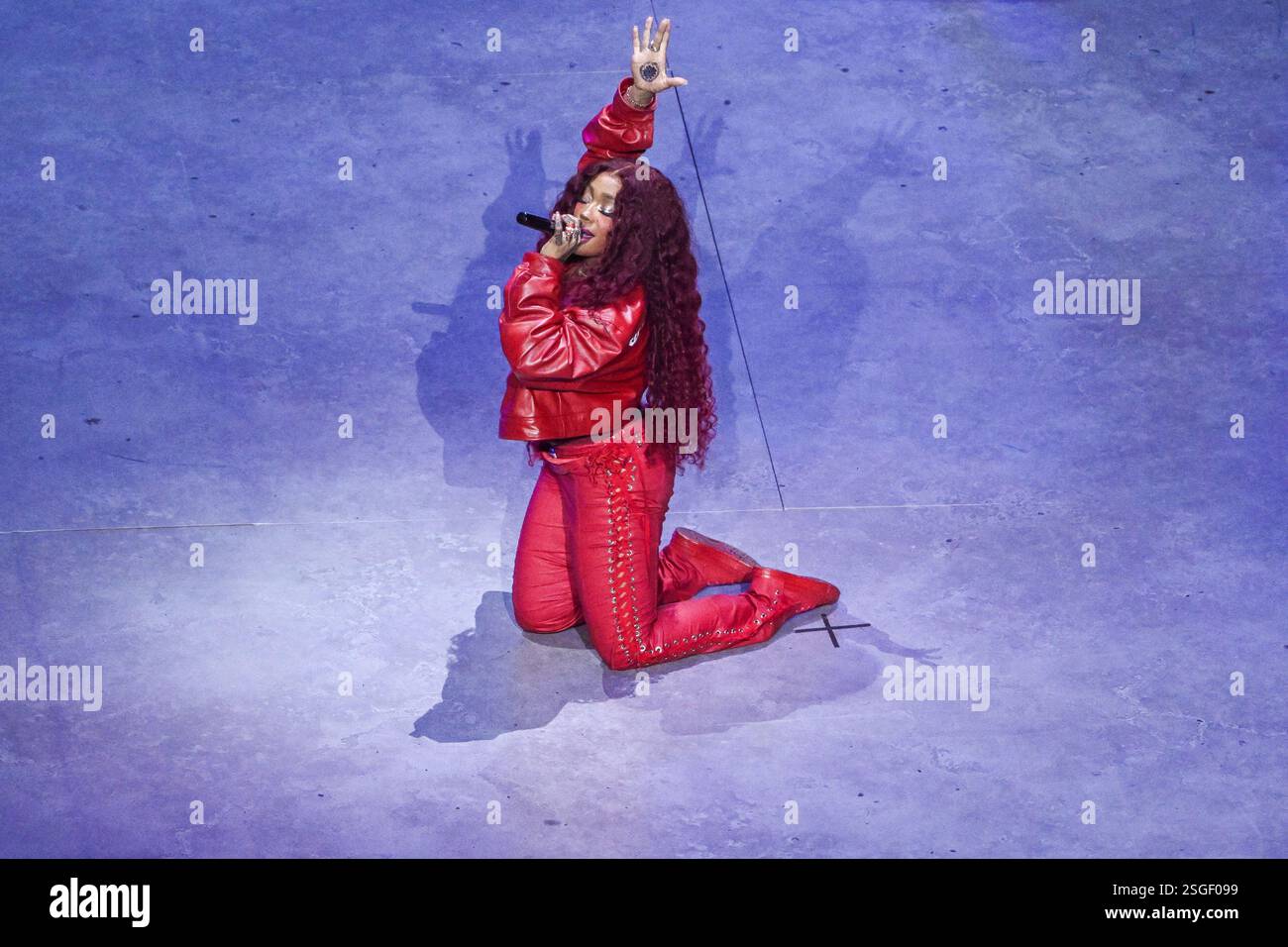 SZA performs during the Apple Music Halftime Show at The Caesars ...