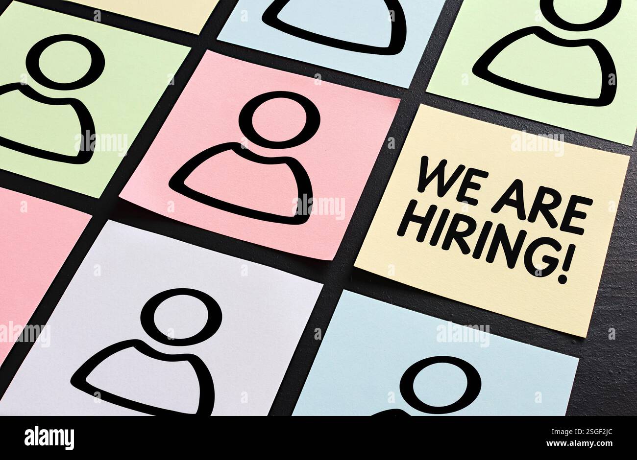 Sticky notes featuring person icons and text indicating we are hiring ...