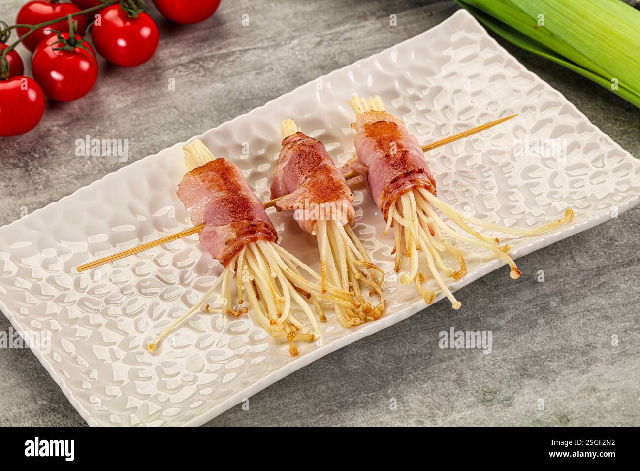 Grilled enoki mushroom with bacon roll wrap Stock Photo - Alamy
