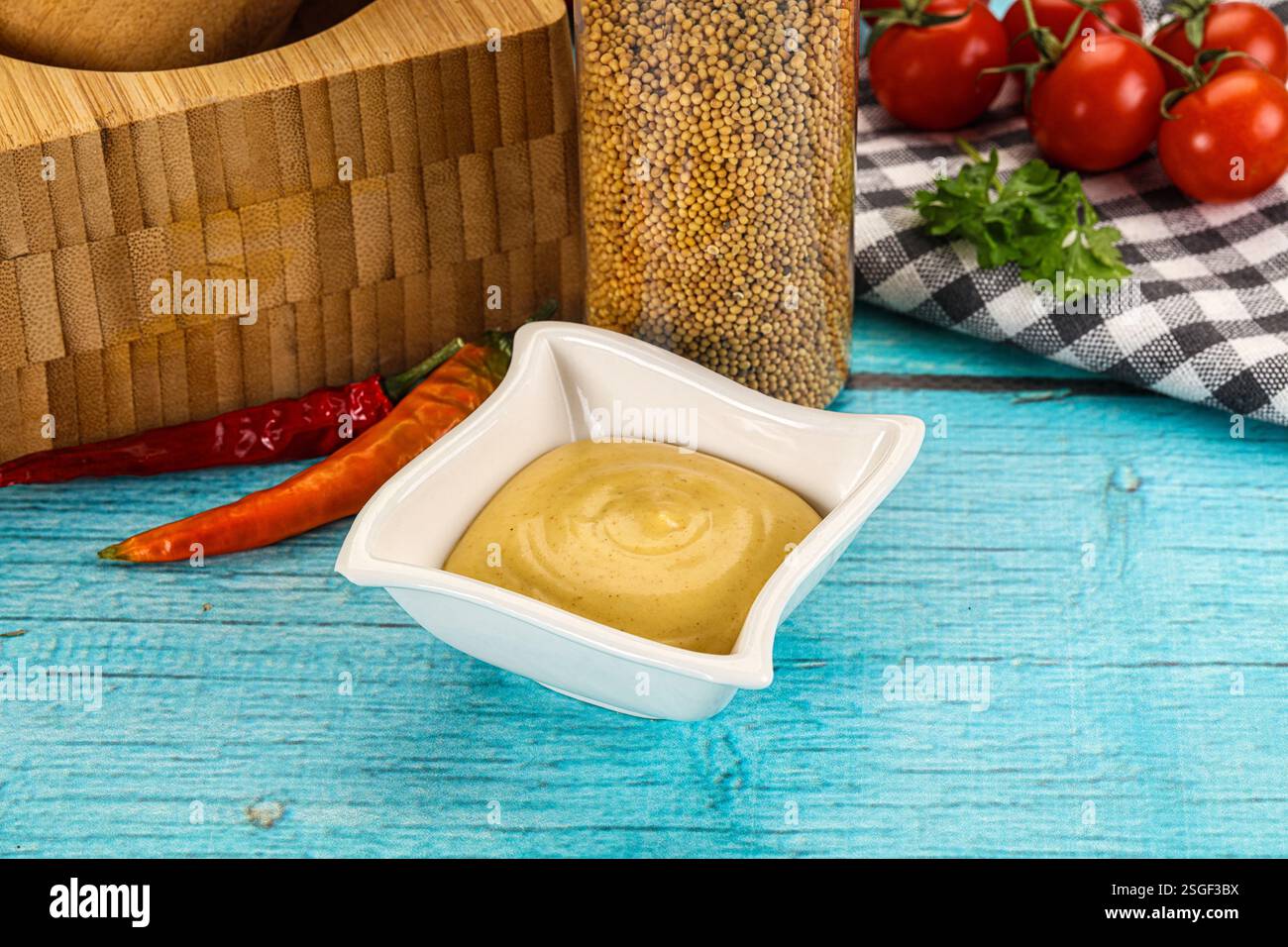 Spicy yellow mustard sauce dip flavoring Stock Photo - Alamy