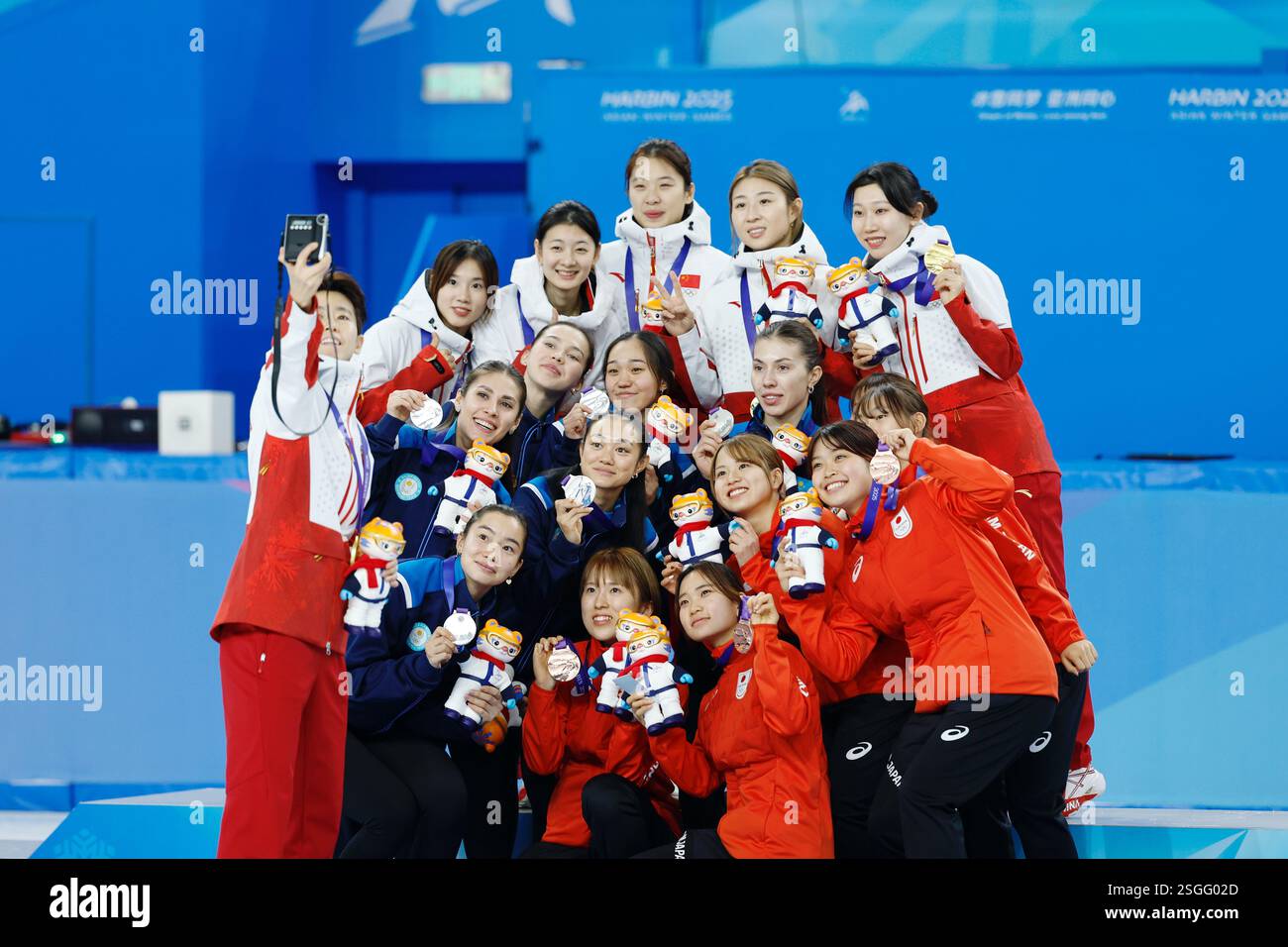 Harbin,China.9th February 2025. Gold medalist Team China, sliver ...
