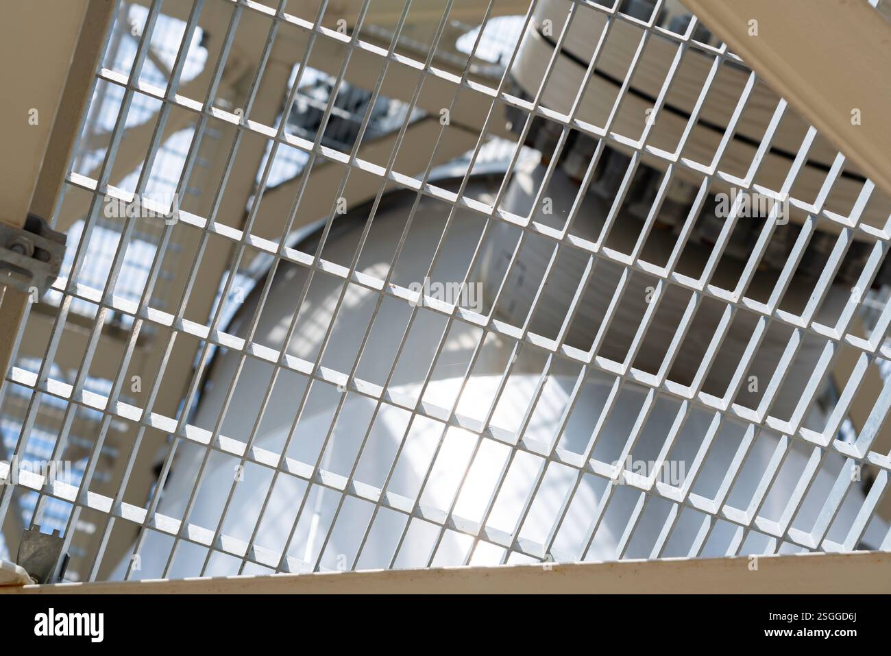 Close-up view of an industrial metal grid and engineering structure ...