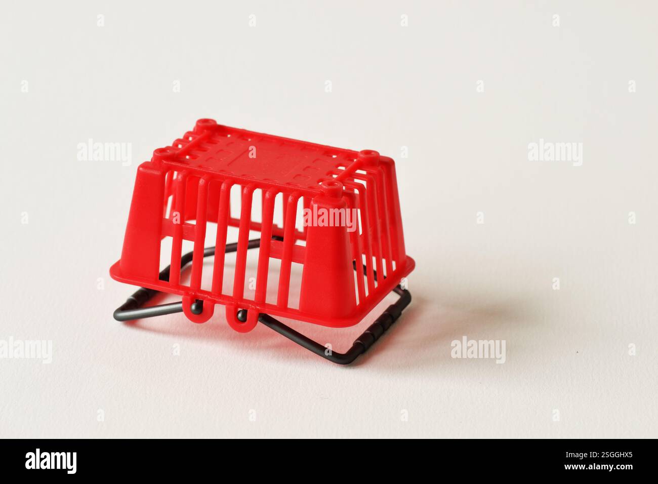 Empty inverted shopping basket on white background - Concept of ...