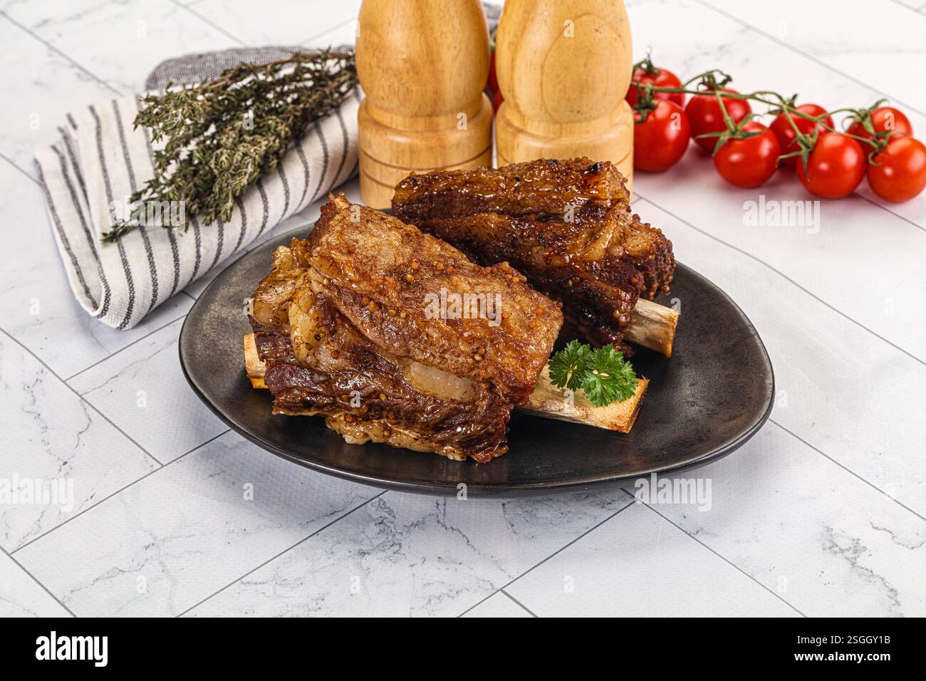 Baked beef ribs with marinade with seasoning Stock Photo - Alamy
