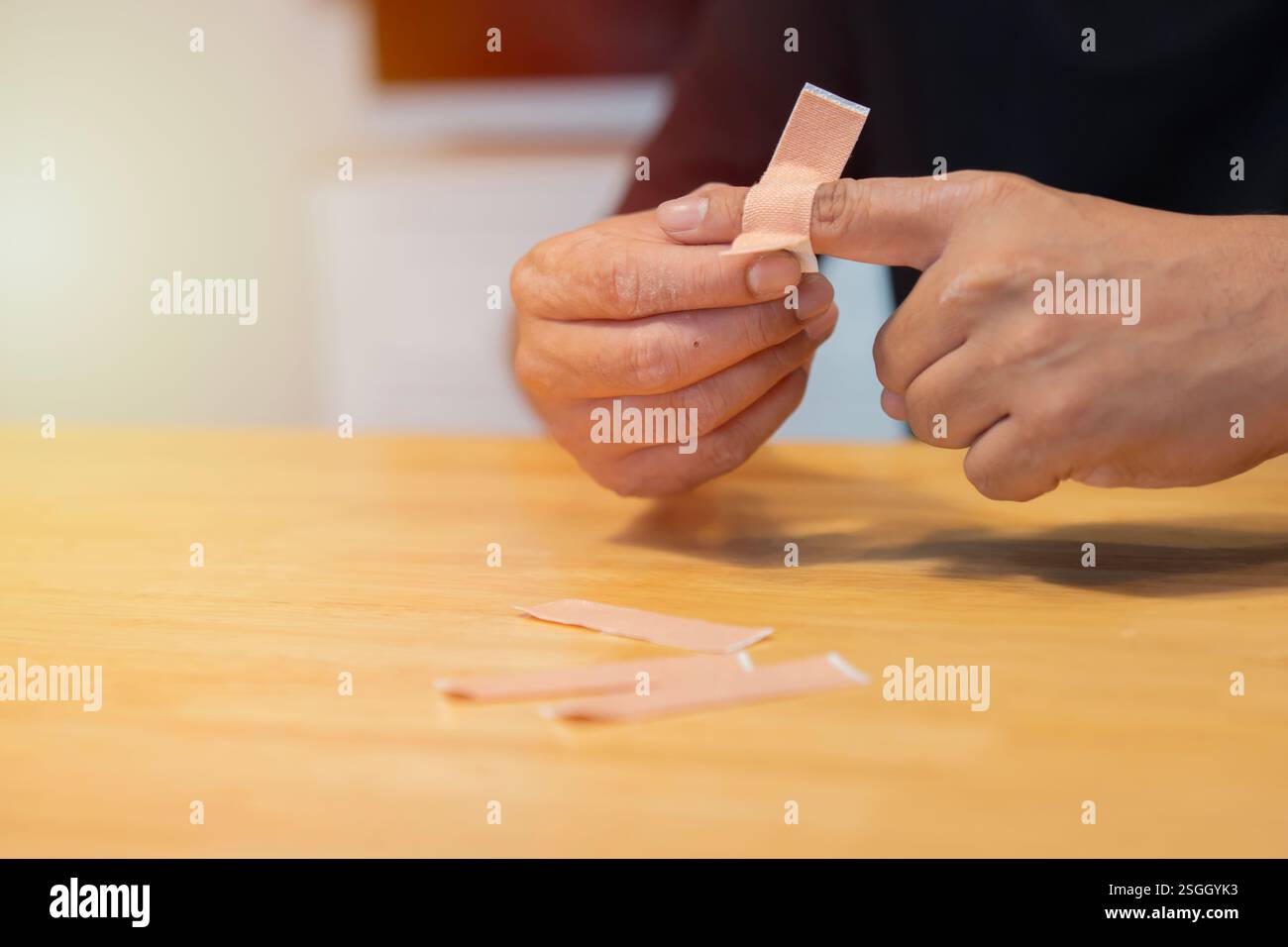 Fingers wrapped in wound healing bandages. The index finger is bandaged ...