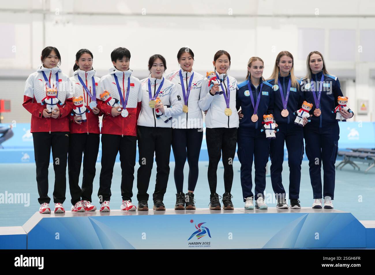 Harbin,China.9th February 2025. (LR) Sliver medalist Team China, gold ...
