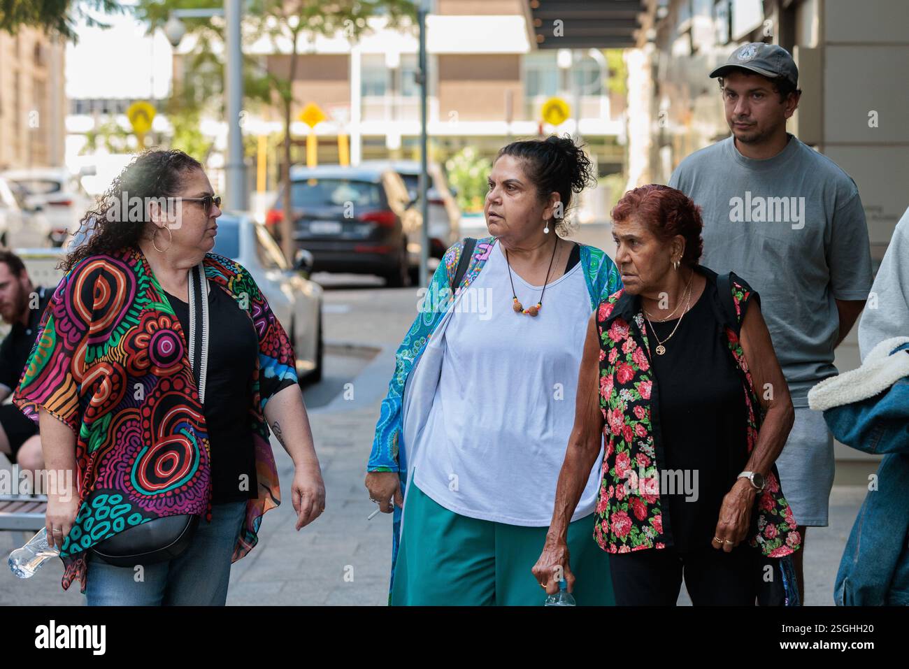 Mechelle Turvey (centre), mother of Cassius Turvey, is seen with family ...