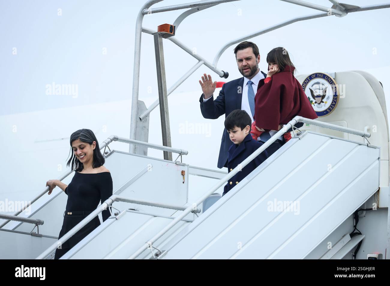 United States Vice-President JD Vance carries his daughter Mirabel as ...