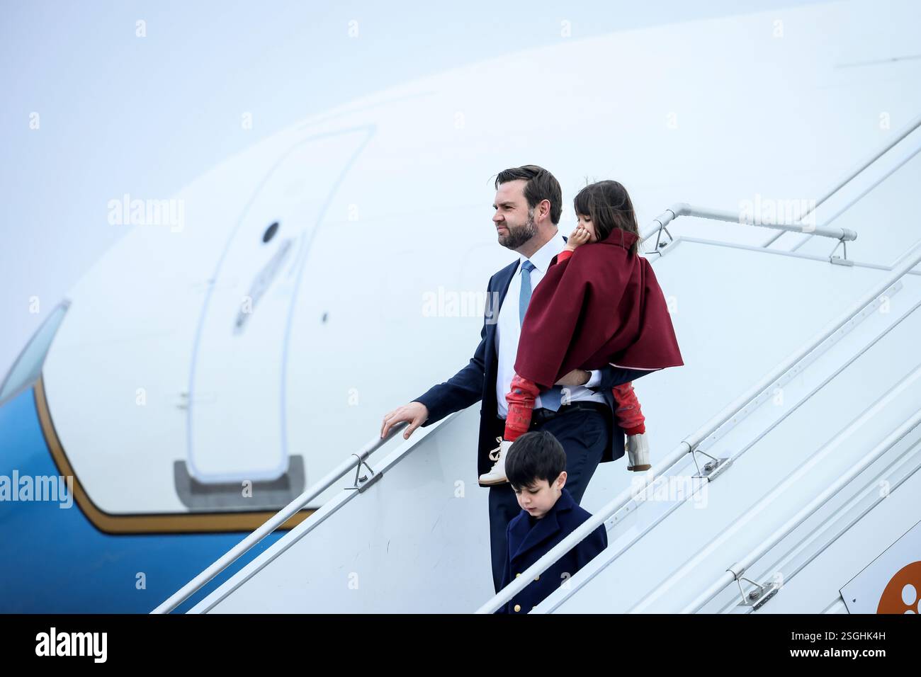 United States Vice-President JD Vance carries his daughter Mirabel as ...