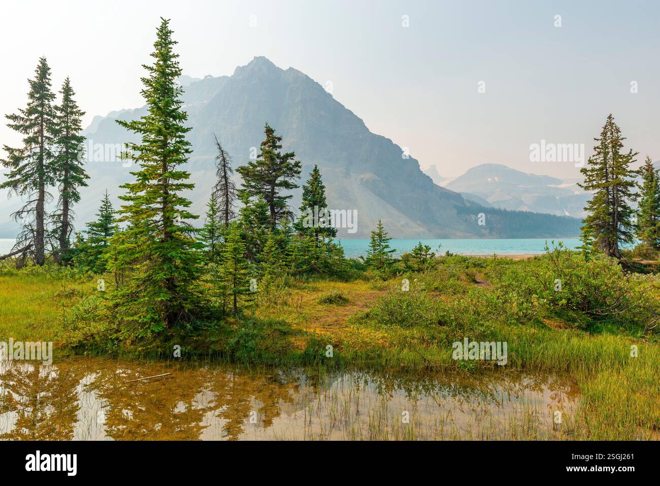 Bow Lake in the haze of forest fire wildfires smoke, Banff national ...