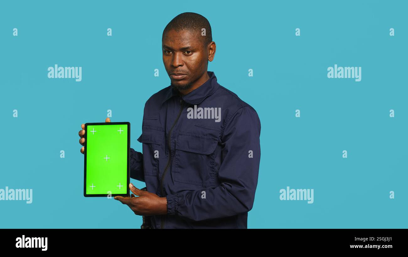 Security guard holding clock, rushing people out of property. Portrait ...