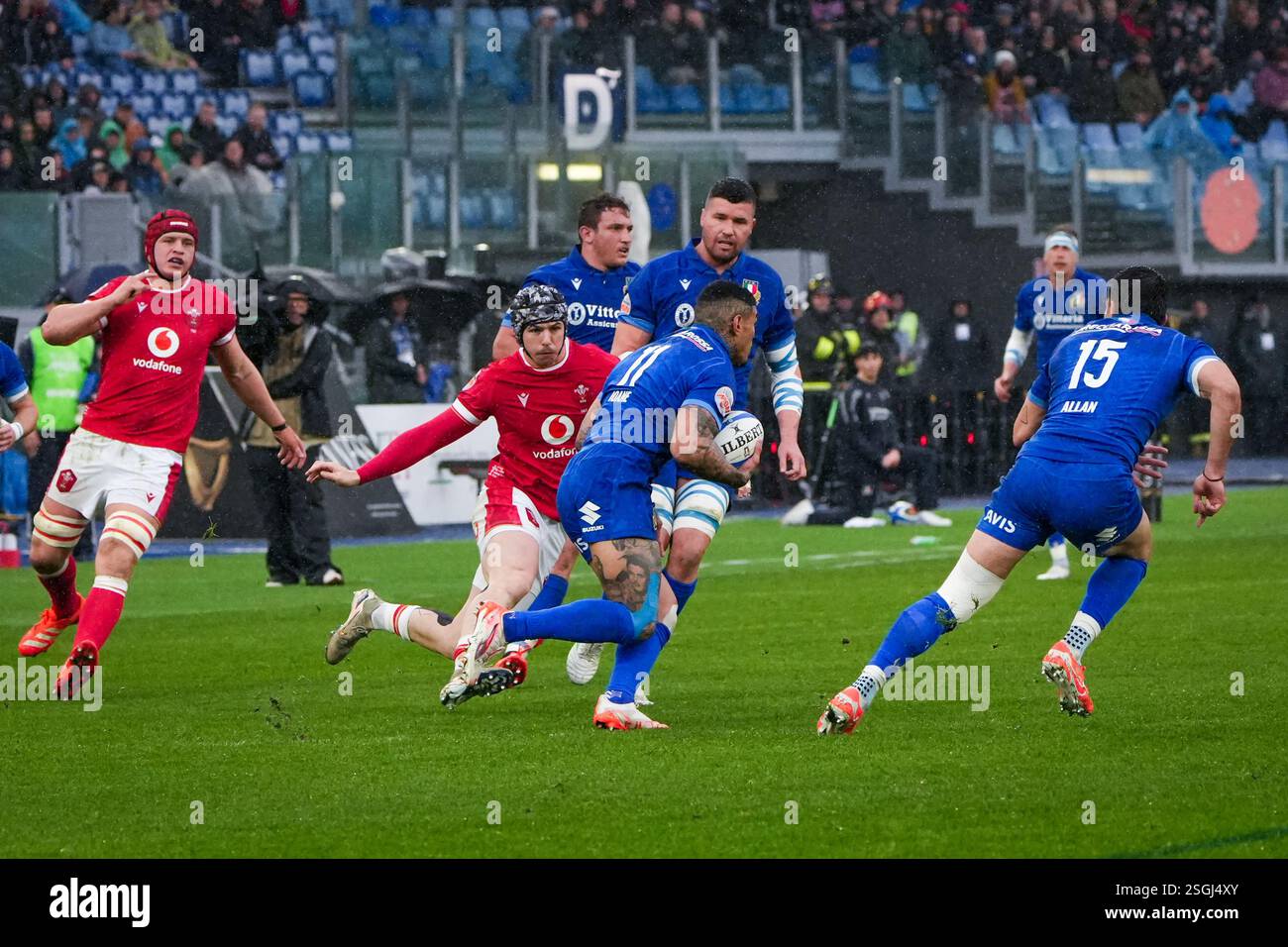 Rome, Italy. 08th Feb, 2025. Monty Ioane of Italy and Tom Rogers of ...