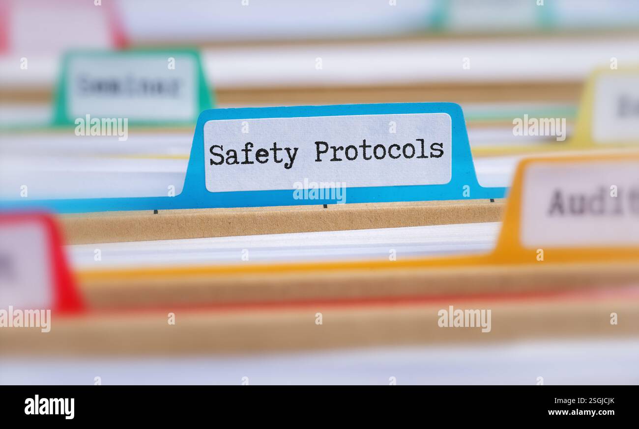 File folders with a tab labeled Safety Protocols Stock Photo - Alamy
