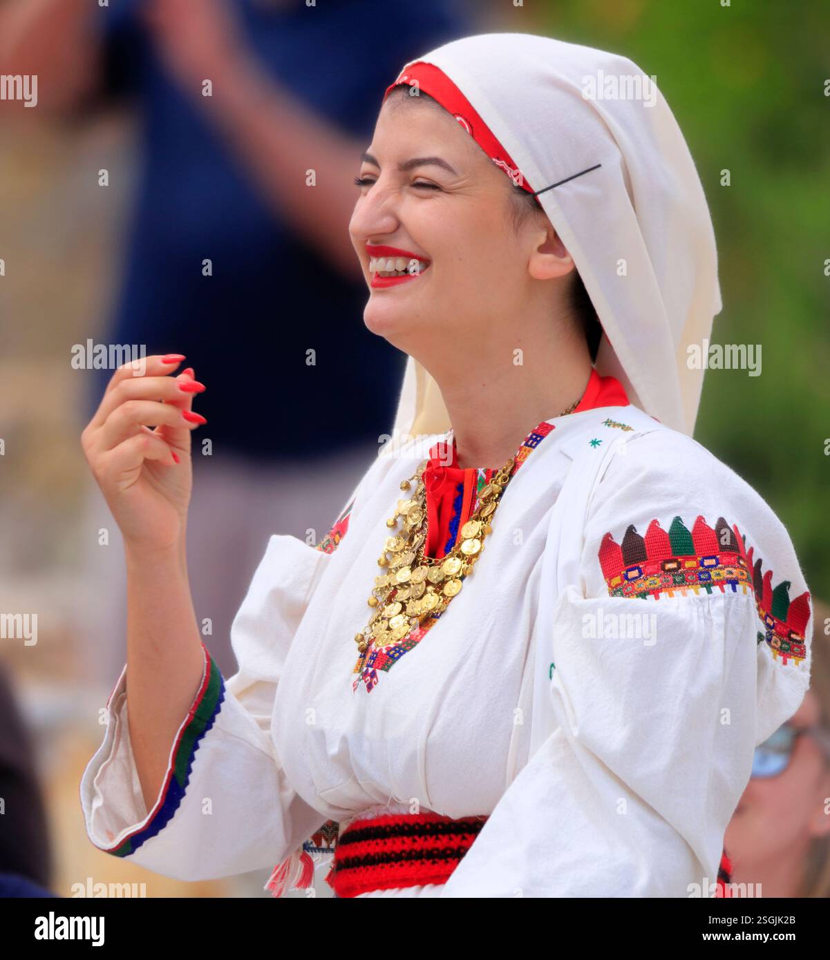 Traditional Greek dancers during the recording of a television ...