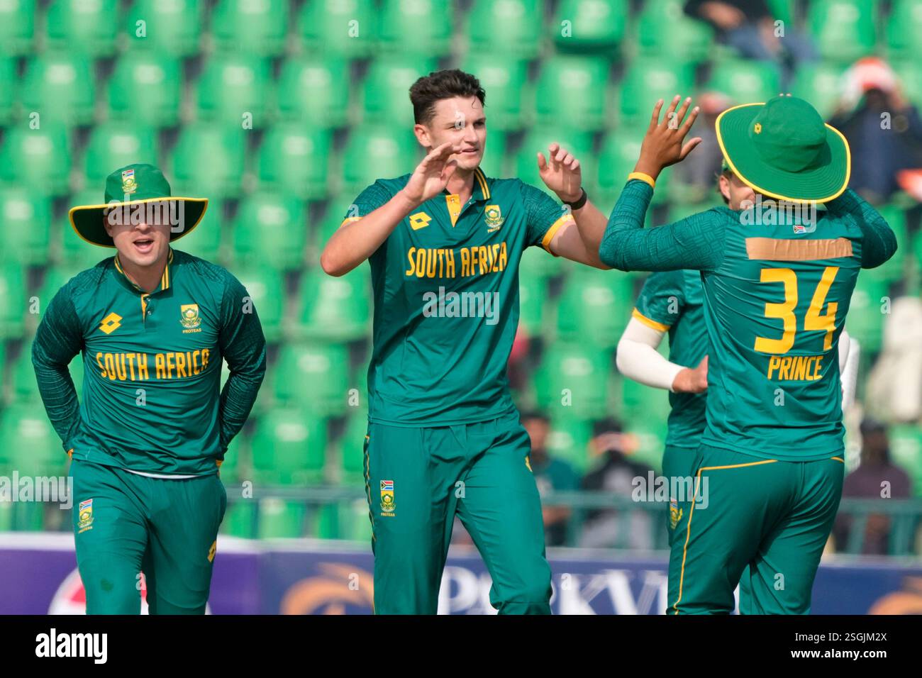 South Africa's Eathan Bosch, center, celebrates with teammates after ...